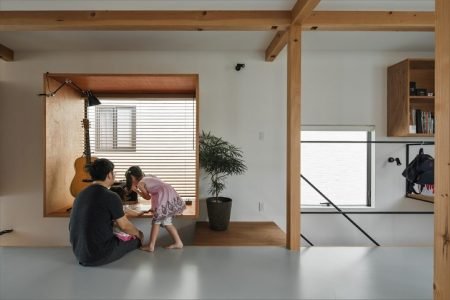 Japanese architects use timber boxes to optimize storage space of a ...